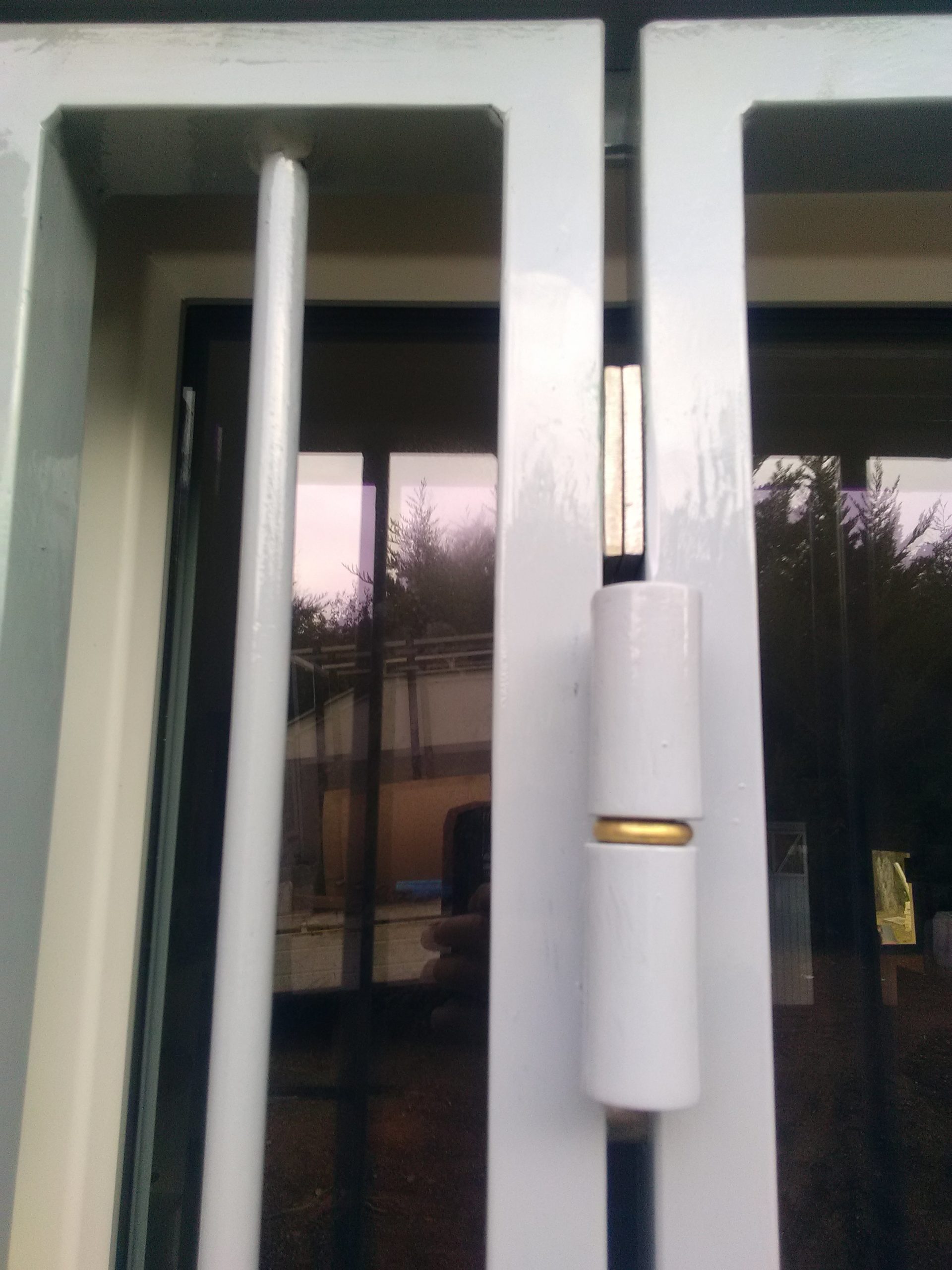 Grille ouvrante articulée avec volet bois - Grille de défense.fr